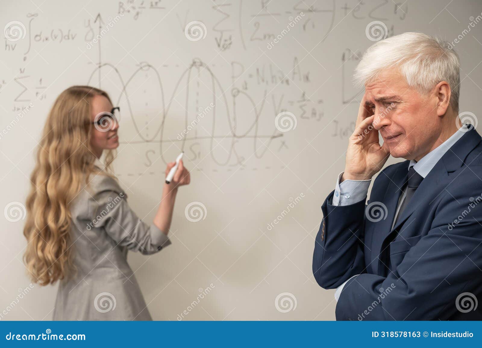 Female Student Answers a Question from an Elderly Professor at a White ...