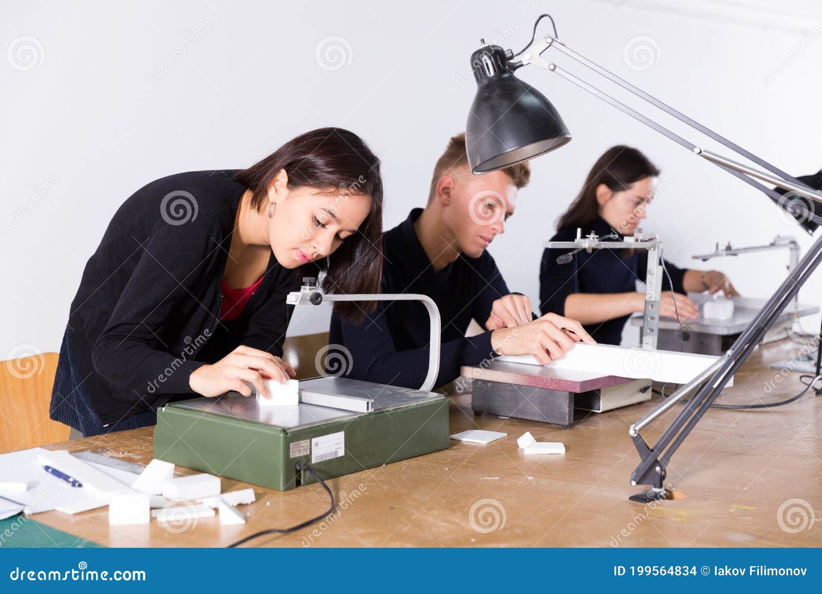 Female Student Using Scroll Saw in Architectural Modeling Stock Photo ... Female Student Using Scroll Saw in Architectural Modeling Stock Photo ...