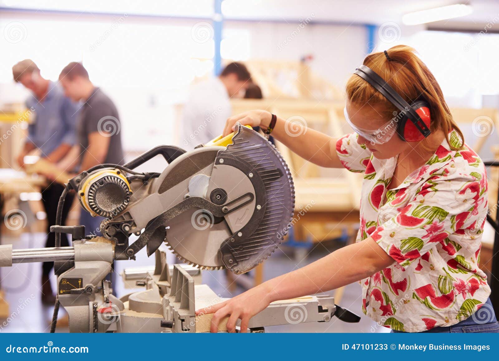 Female Student in Carpentry Class Using Circular Saw Stock Image ...
