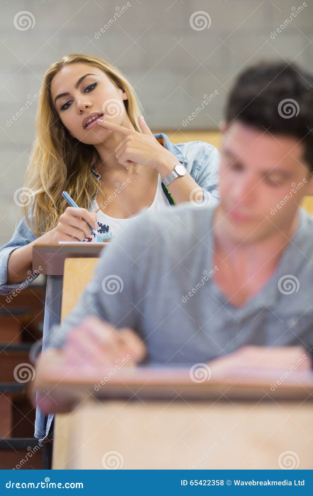 Student Is Cheating During Exam With Cheat Sheet With Formula Royalty ...
