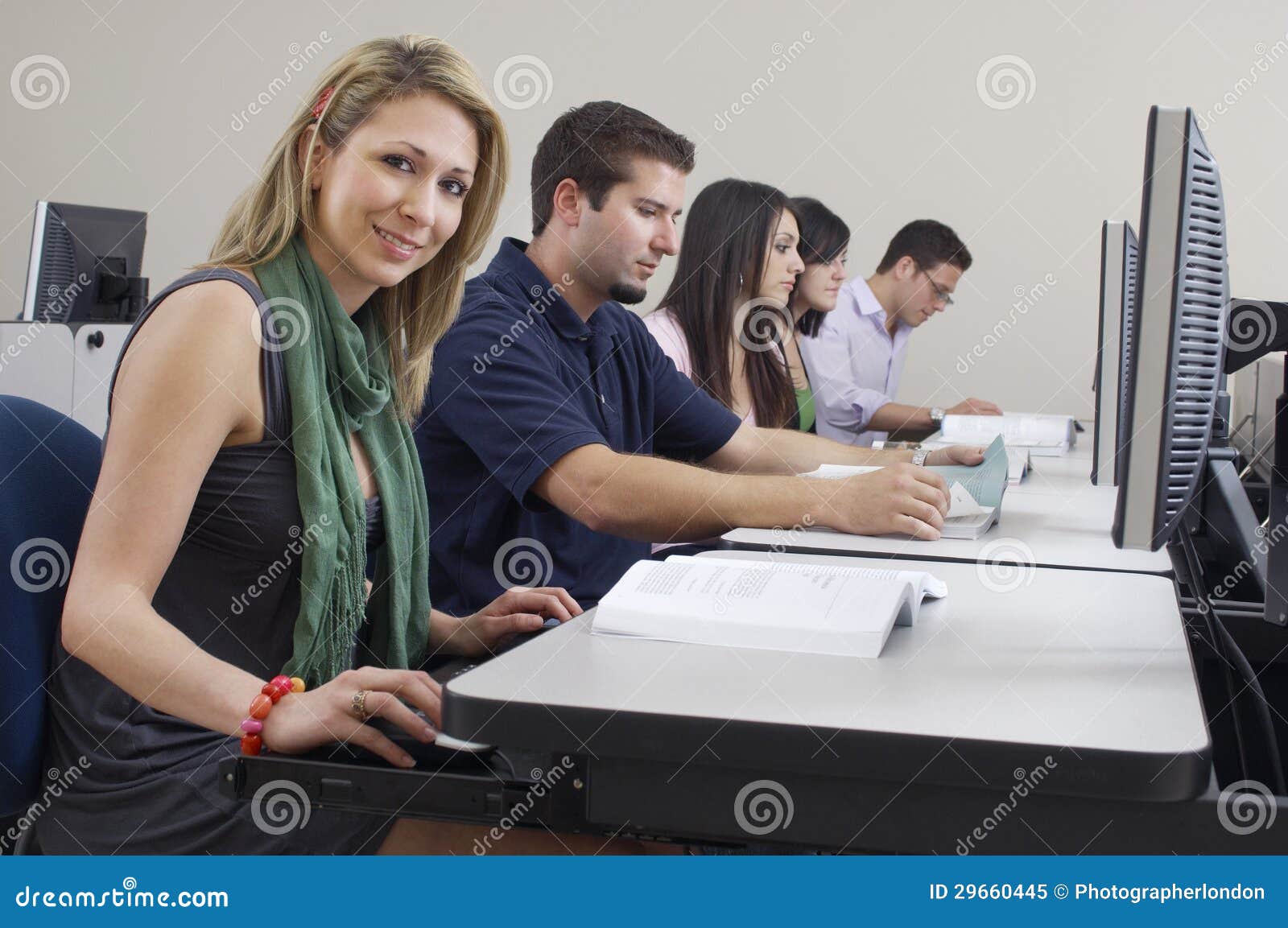 Female Student with Classmates in Computer Lab Stock Image - Image of ...