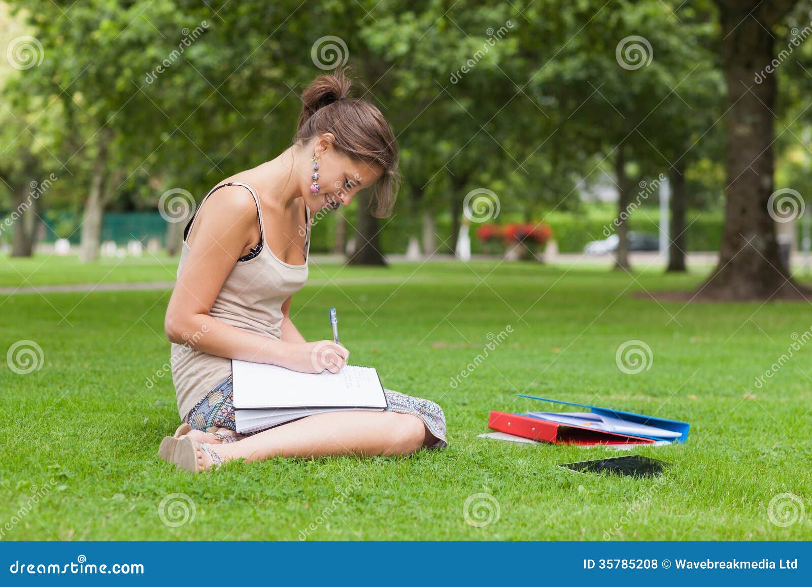 Female Student Doing Homework at the Park Stock Photo - Image of women ...