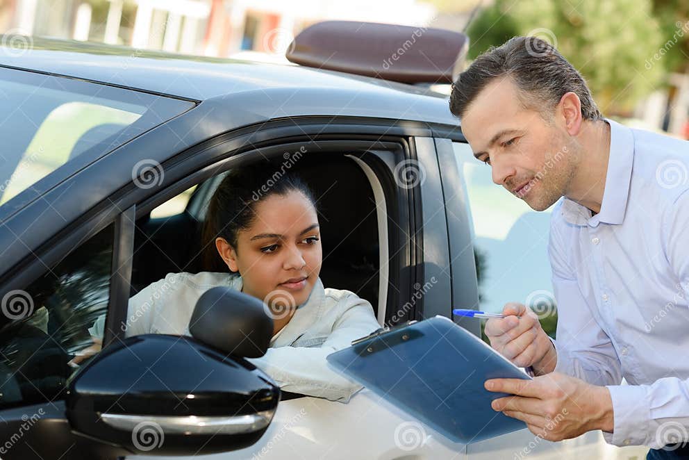 Female Student Driver Taking Driving Test Stock Image - Image of casual ...