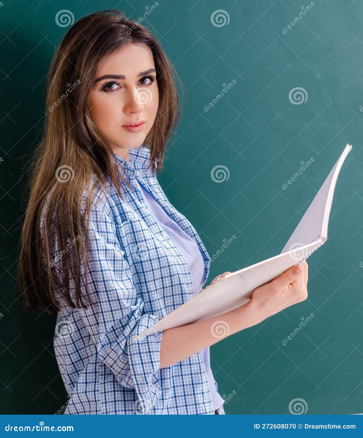 Female Student in Front of Chalkboard Stock Photo - Image of notes ...