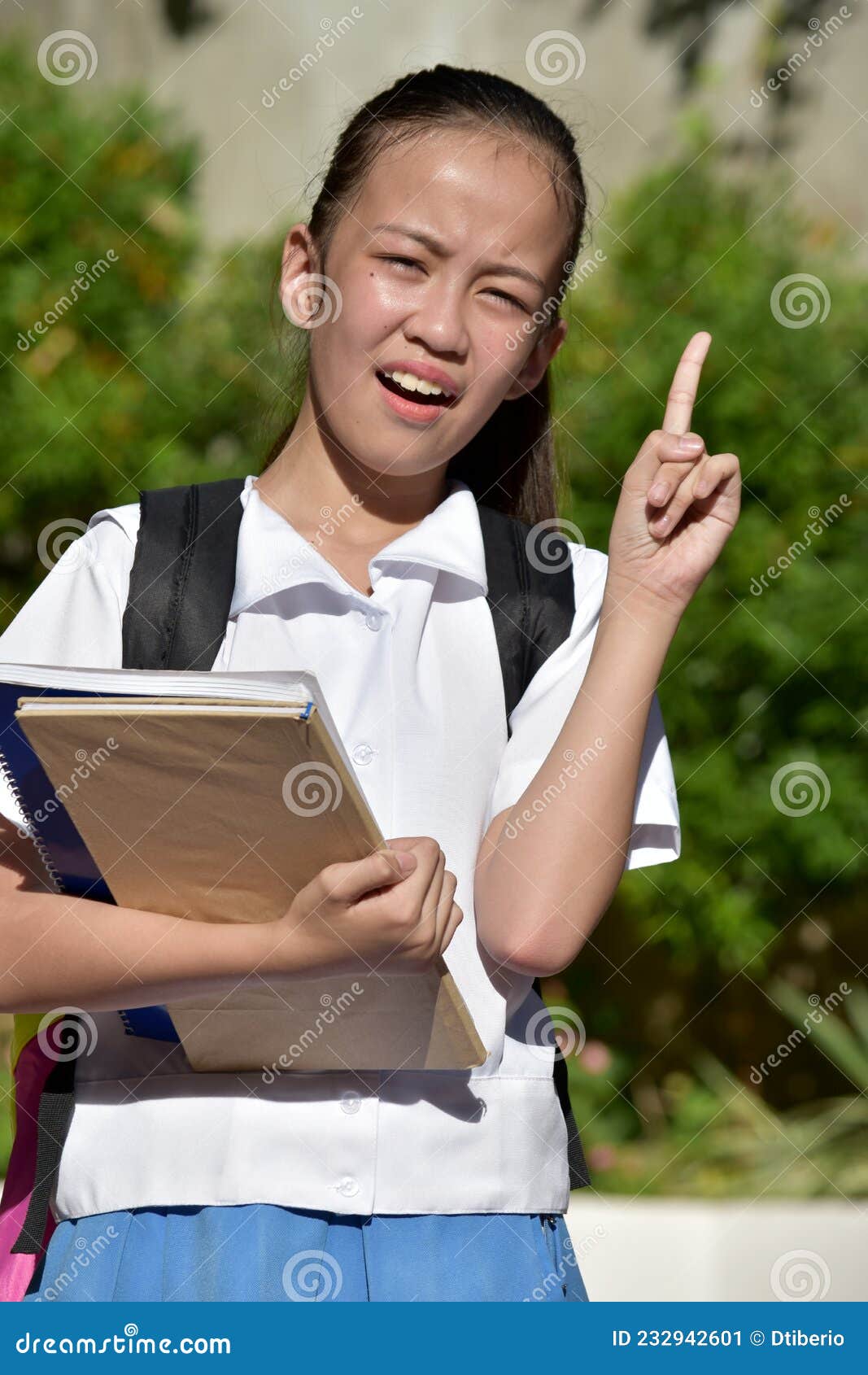 Female Student Having an Idea with Textbooks Stock Image - Image of ...