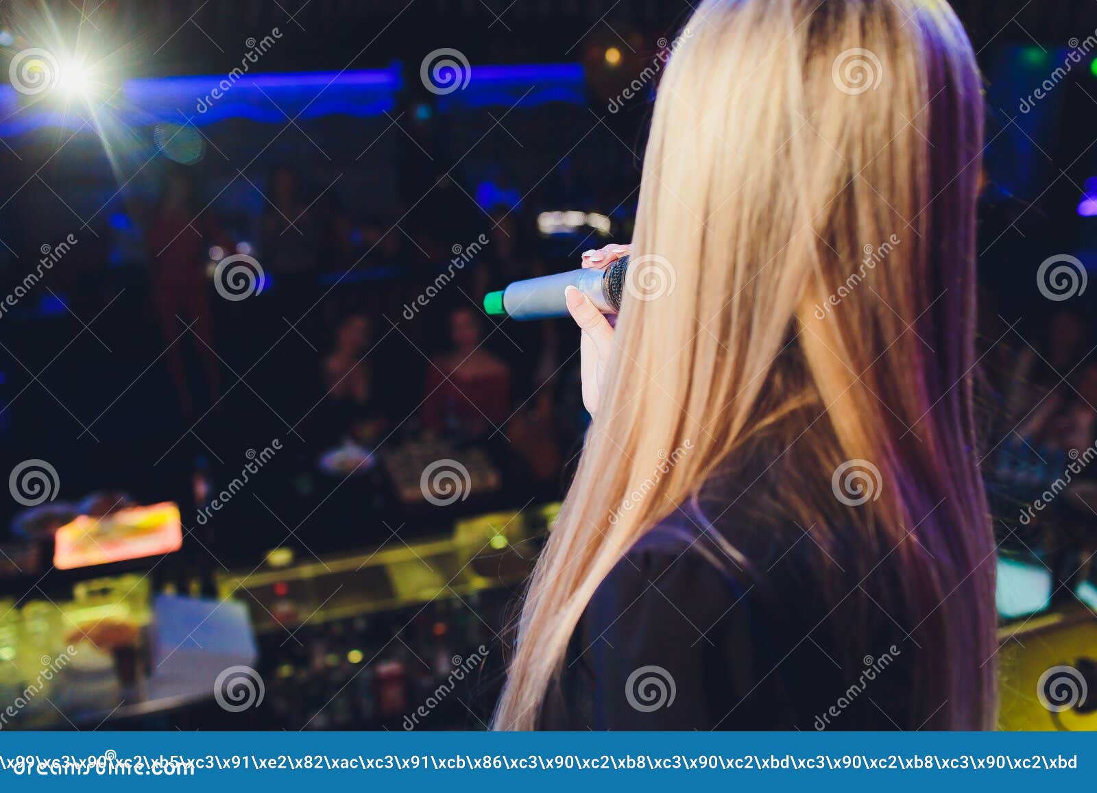 The Female Student is Holding the Black Wireless Microphone in the Left ...
