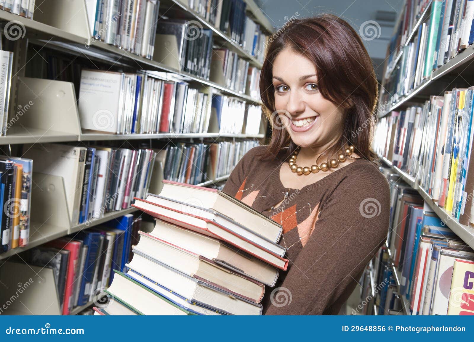 Female Student Holding Stack of Books Stock Photo - Image of read ...