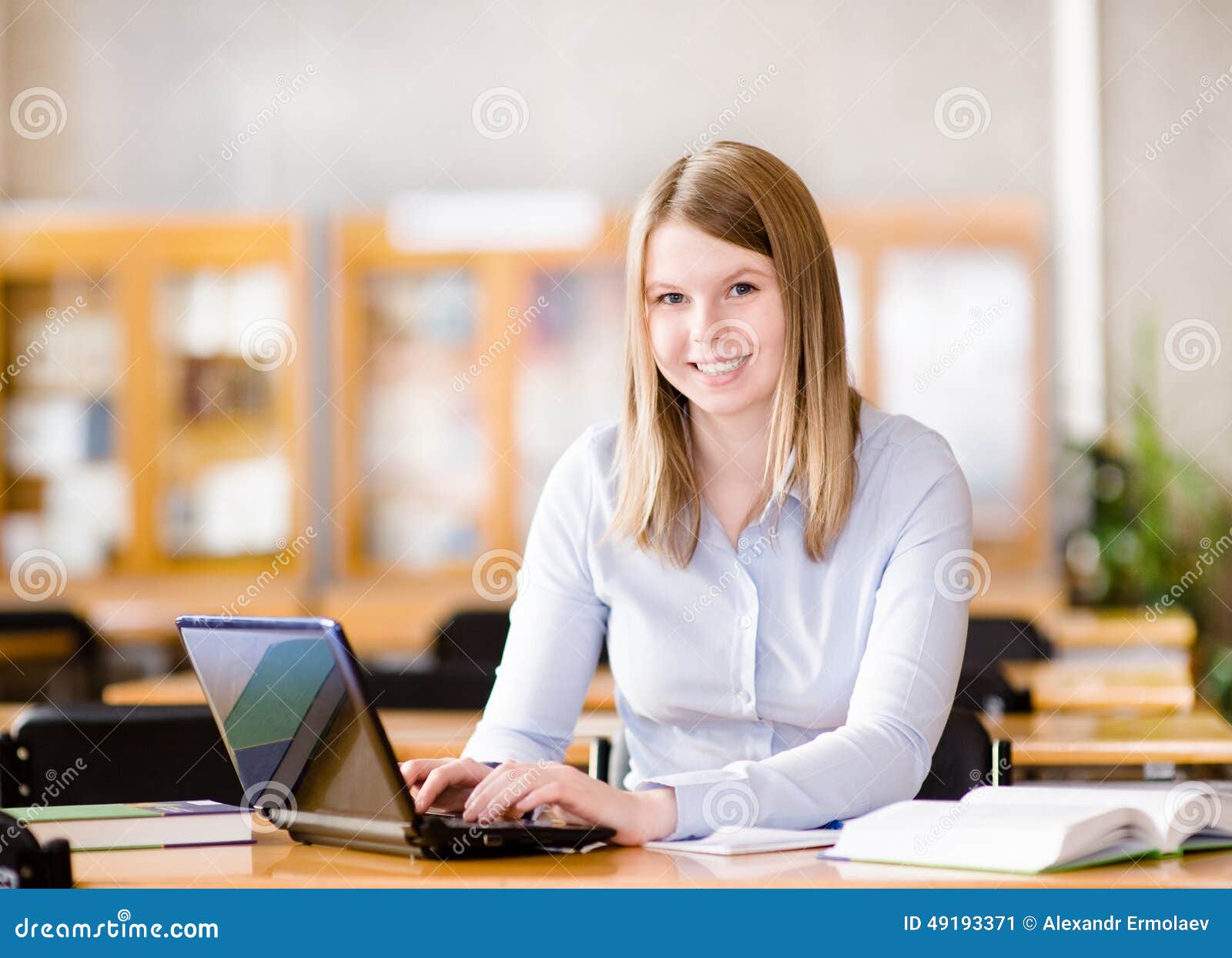 Female Student with Laptop Working in Library Stock Image - Image of ...