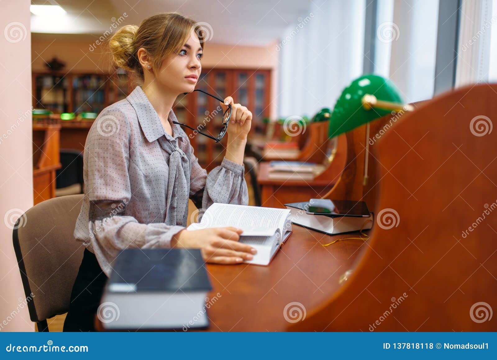 Female Student Learning Book in University Library Stock Photo - Image ...