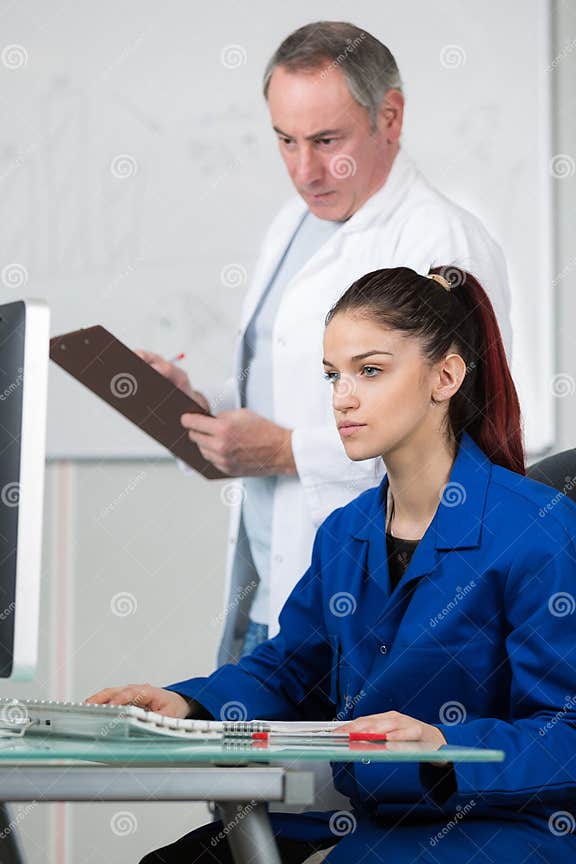 Female Student Looking at Desktop Computer Screen Stock Photo - Image ...