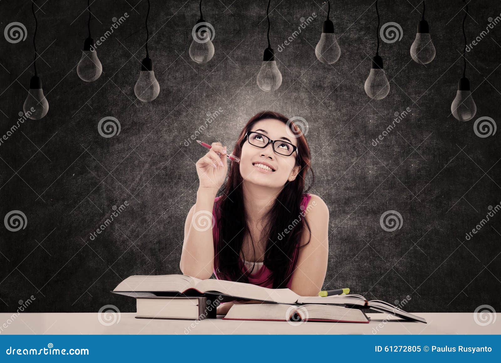 Female Student Looking at Light Bulbs Stock Image - Image of board ...
