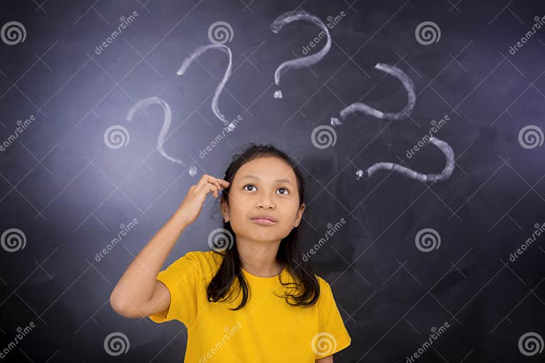Female Student Looking at Question Marks Stock Image - Image of ...