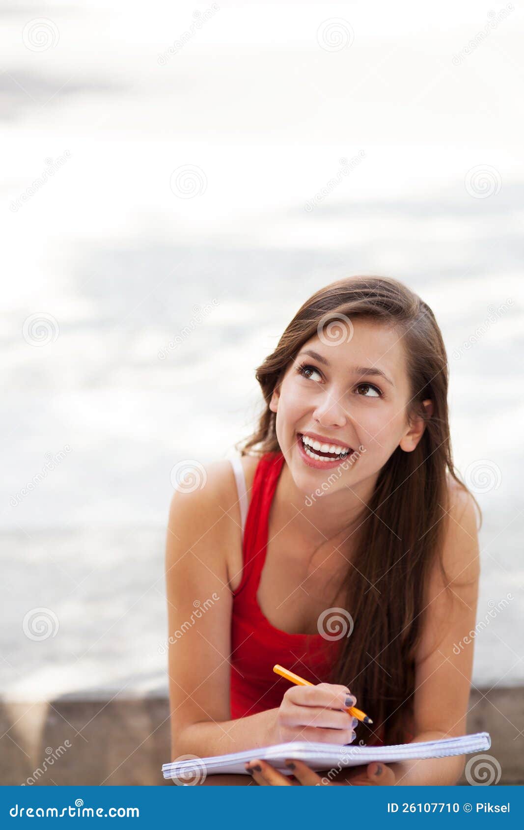 Female student looking up stock photo. Image of happiness - 26107710