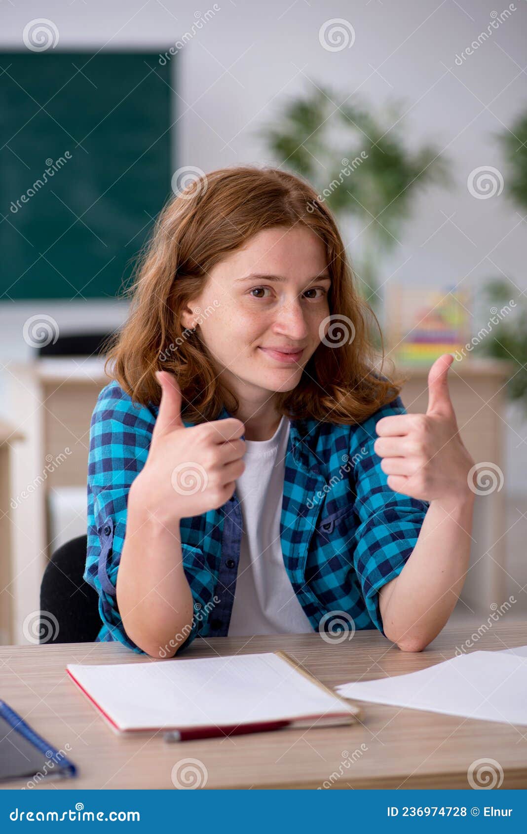 Young Female Student Preparing for Exam in the Classroom Stock Photo ...