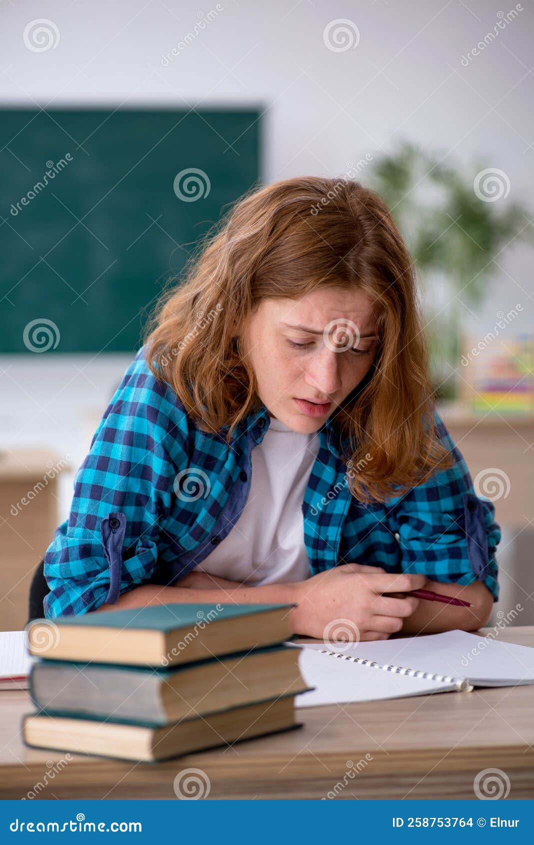 Young Female Student Preparing for Exam in the Classroom Stock Photo ...