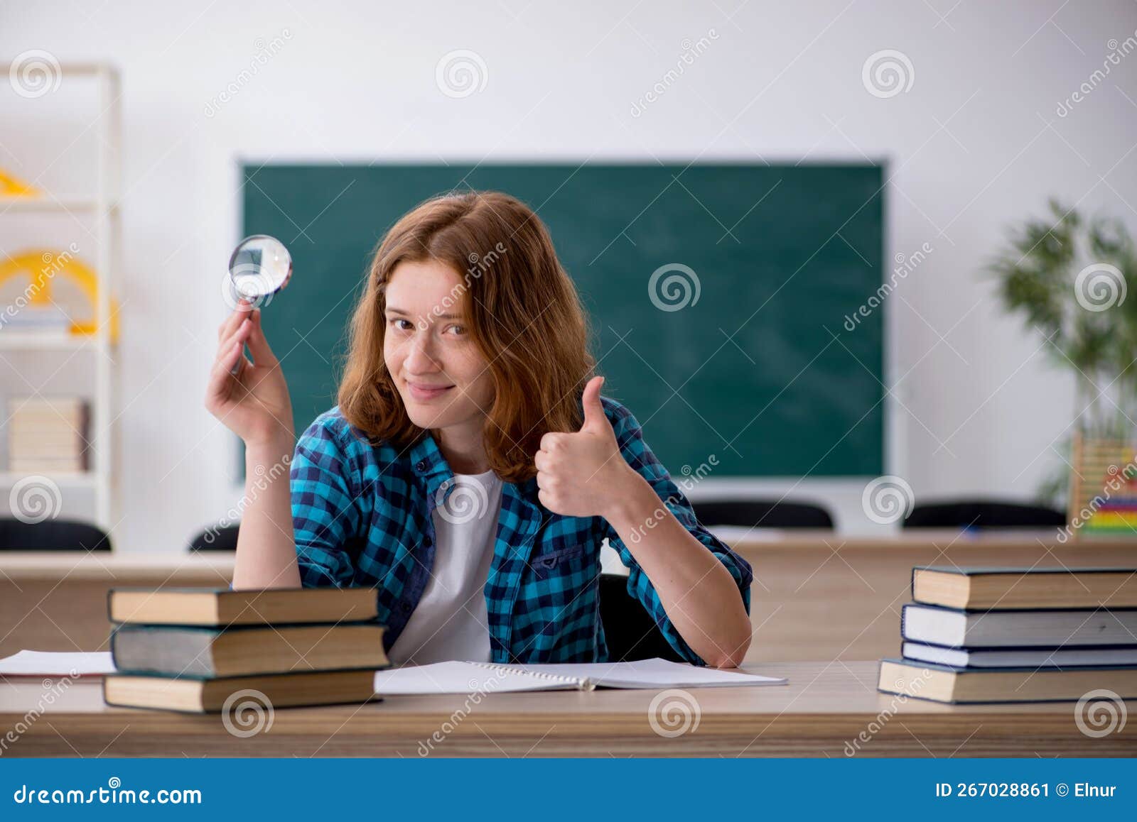 Young Female Student Preparing for Exam in the Classroom Stock Image ...