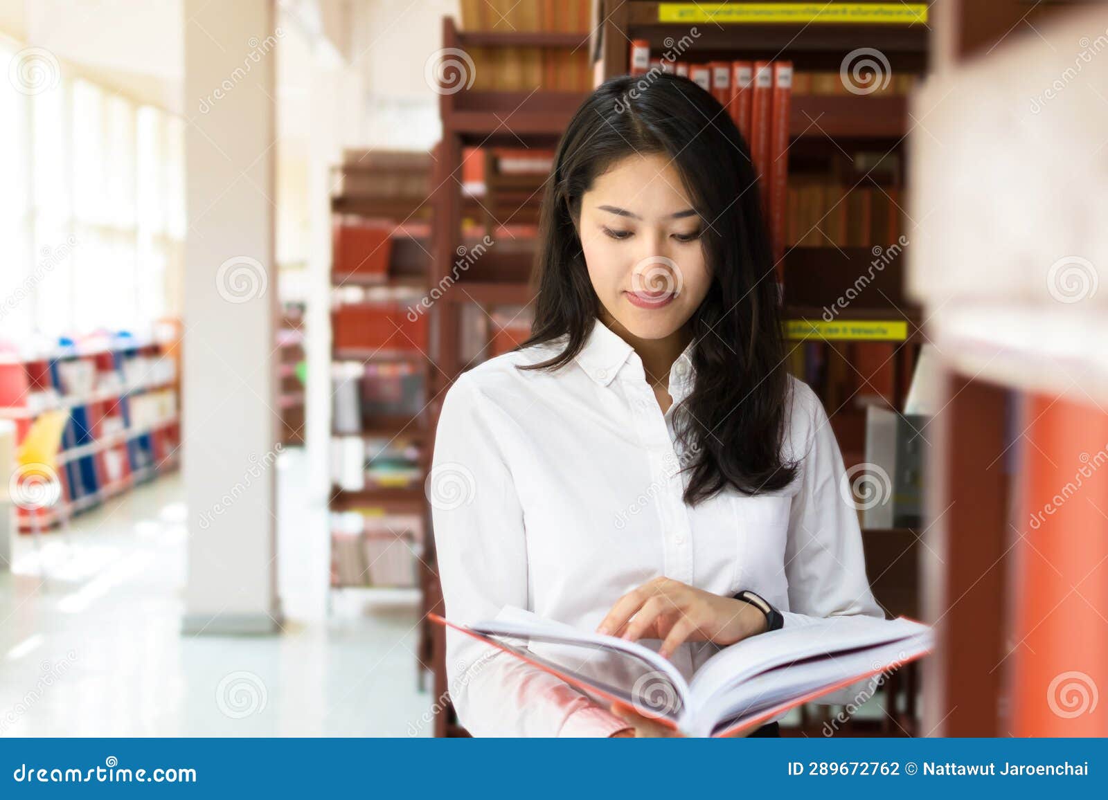 Female Student Reading a Book Stock Photo - Image of college, adult ...