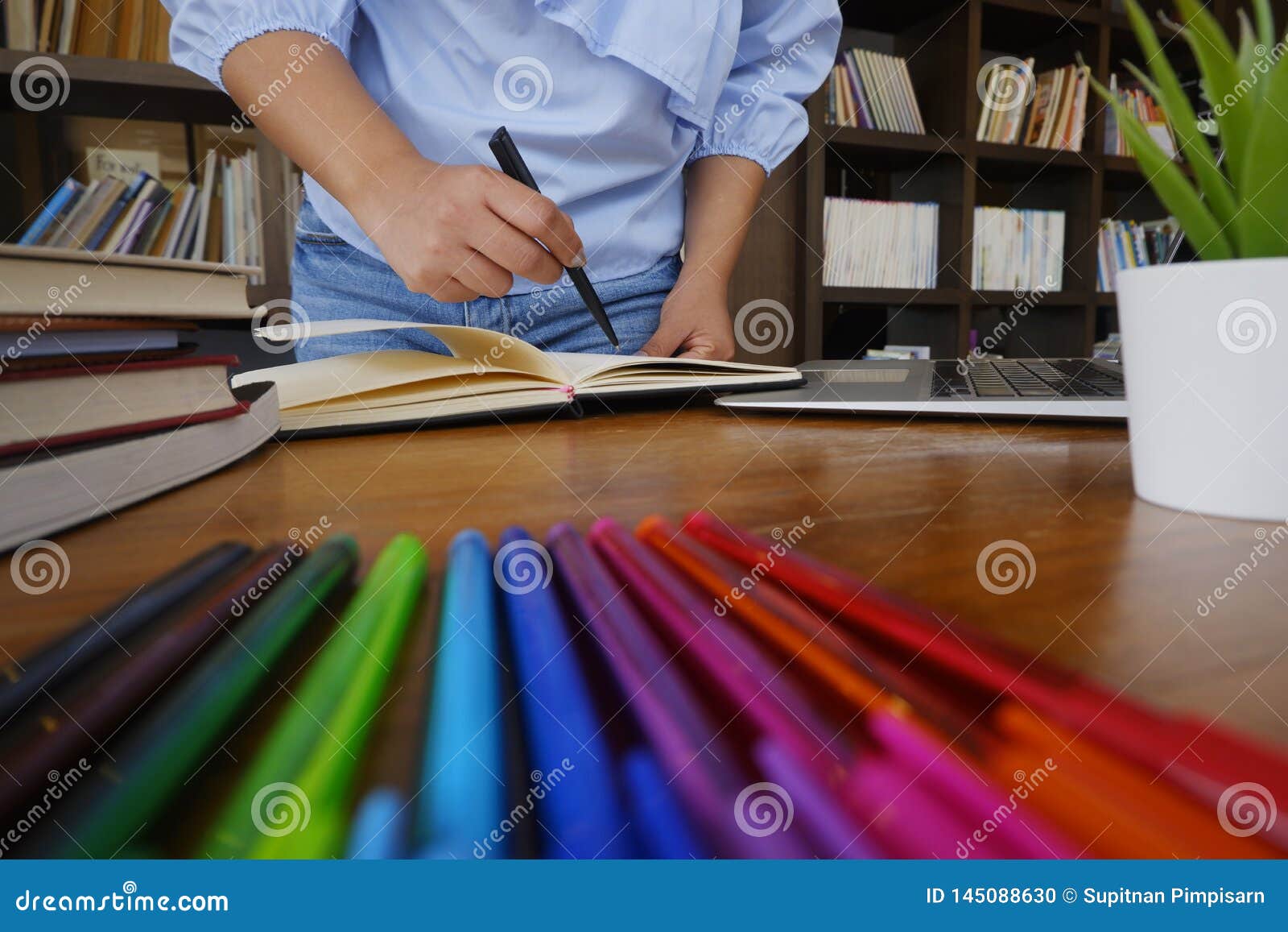 Female Student Reading Books Study Research in Library for Education ...
