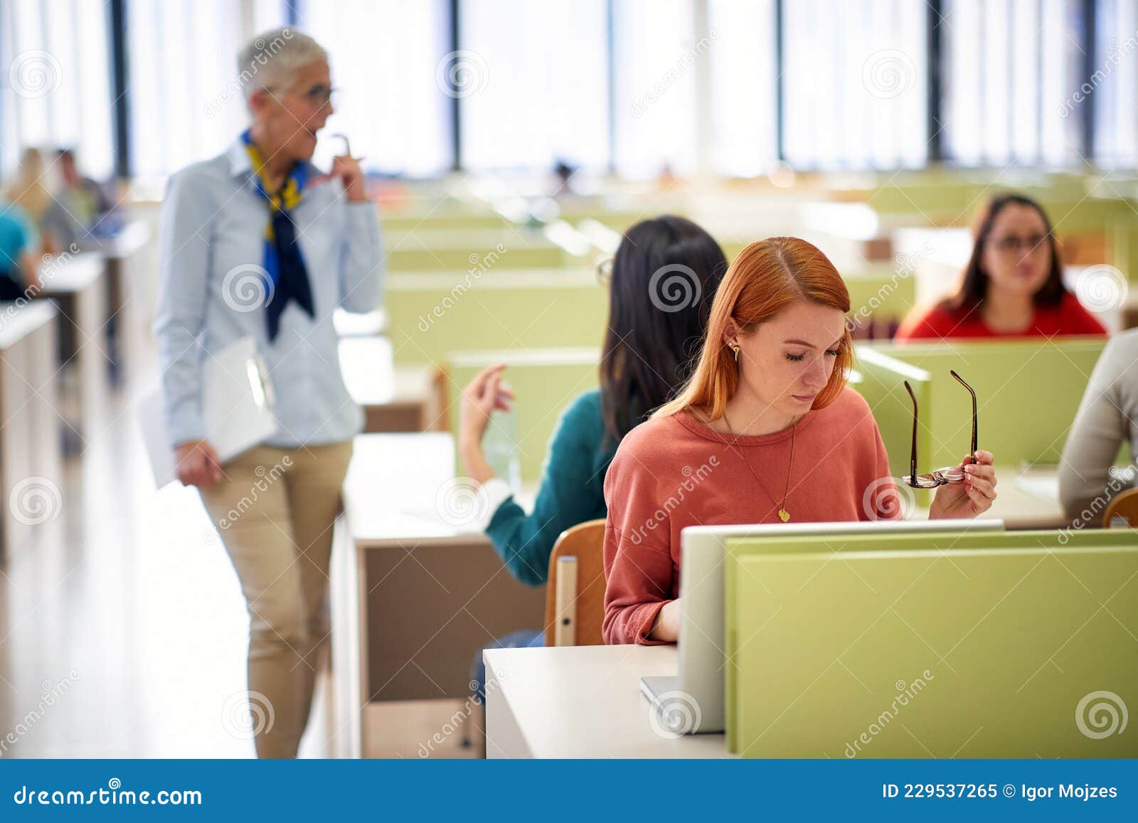 Female Student Reading a Lesson at a Lecture Stock Image - Image of ...