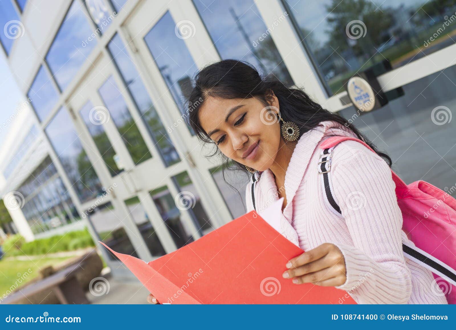 Female Student Reading Textbook Stock Photo - Image of education ...