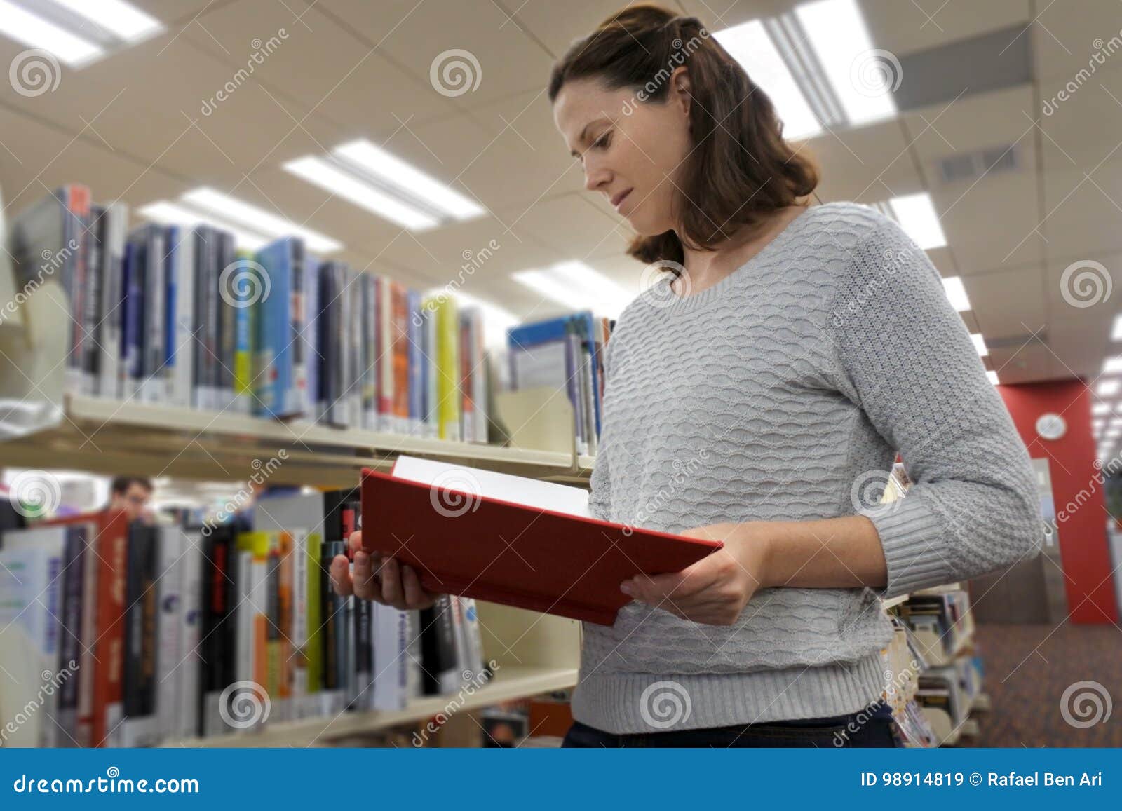 Female Student Researching Books in a Library Stock Image - Image of ... Female Student Researching Books in a Library Stock Image - Image of ...
