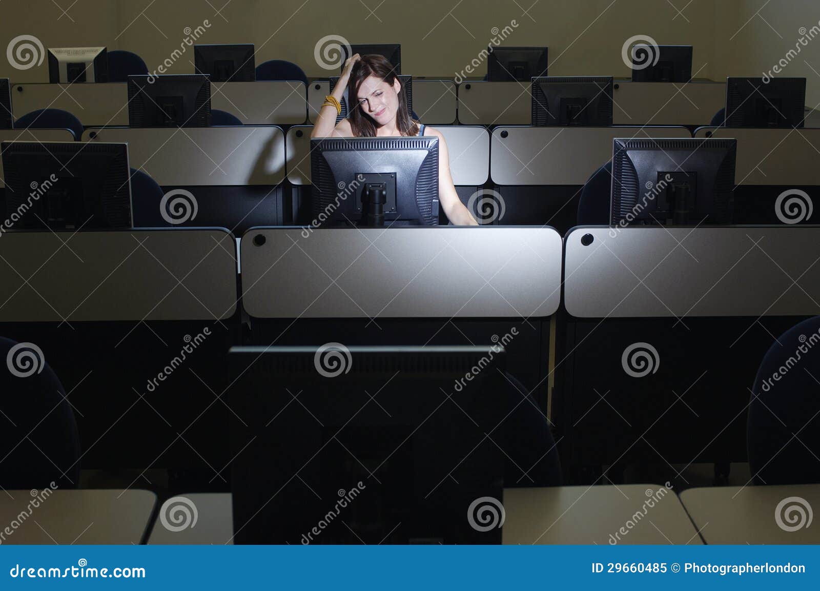 Female Student Scratching Head while Looking at Computer Stock Image ...