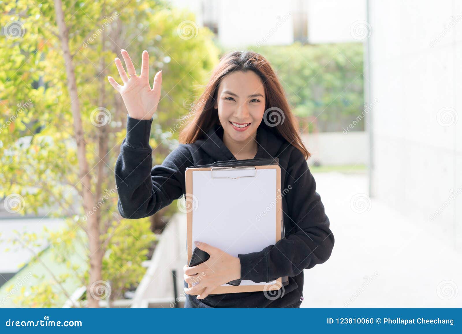Female Student Stand at Garden at Campus Stock Photo - Image of ...