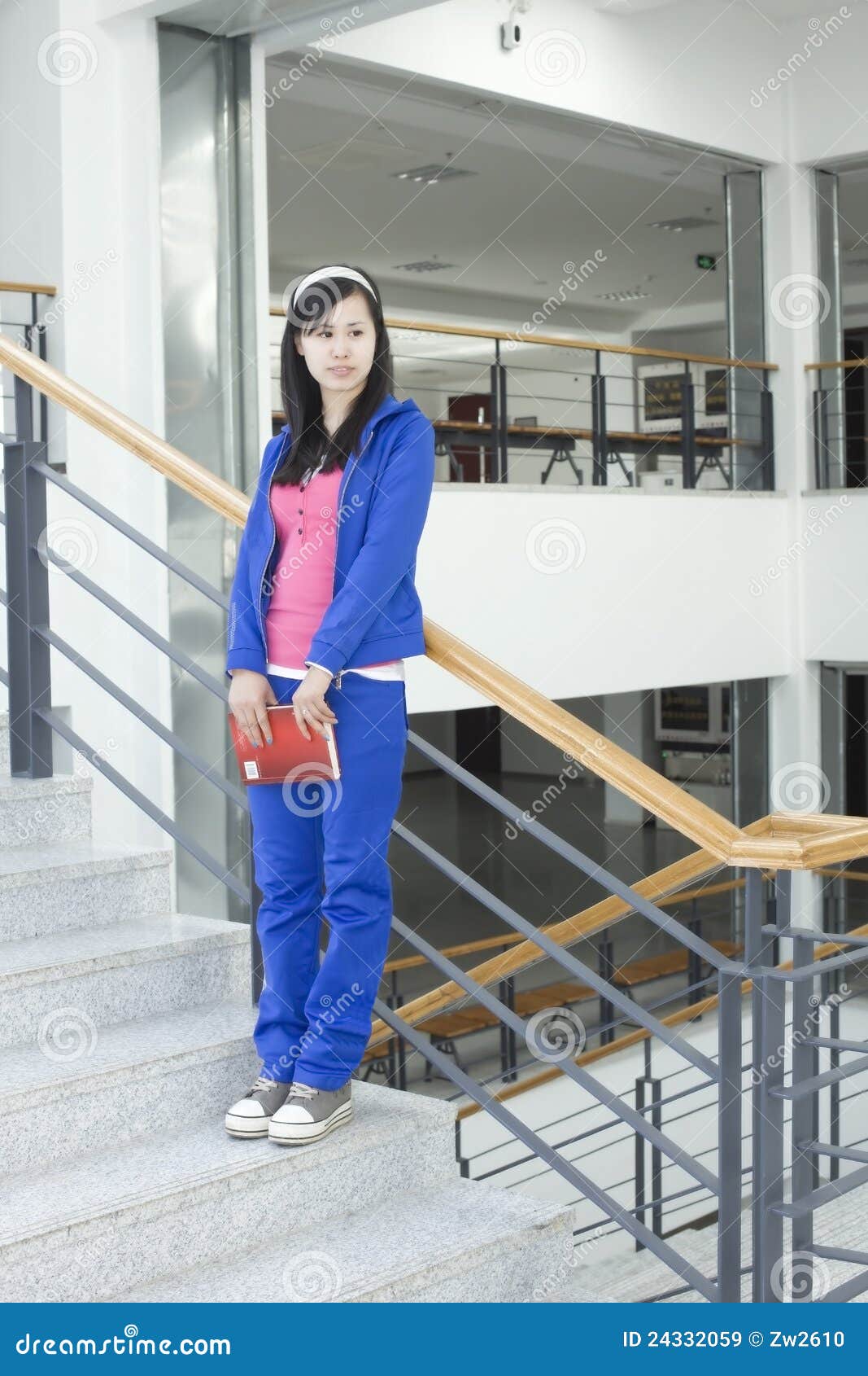 A Female Student Standing on the Stair Stock Image - Image of standing ...