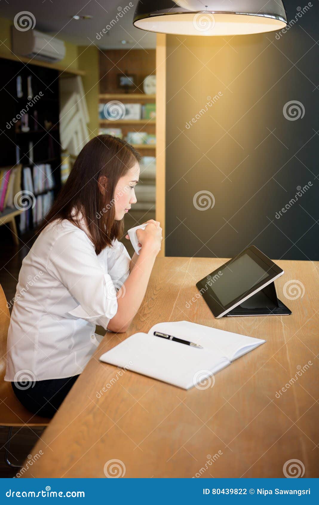 Female Student Study in School Library, Using Tablet, Laptop and Stock ...
