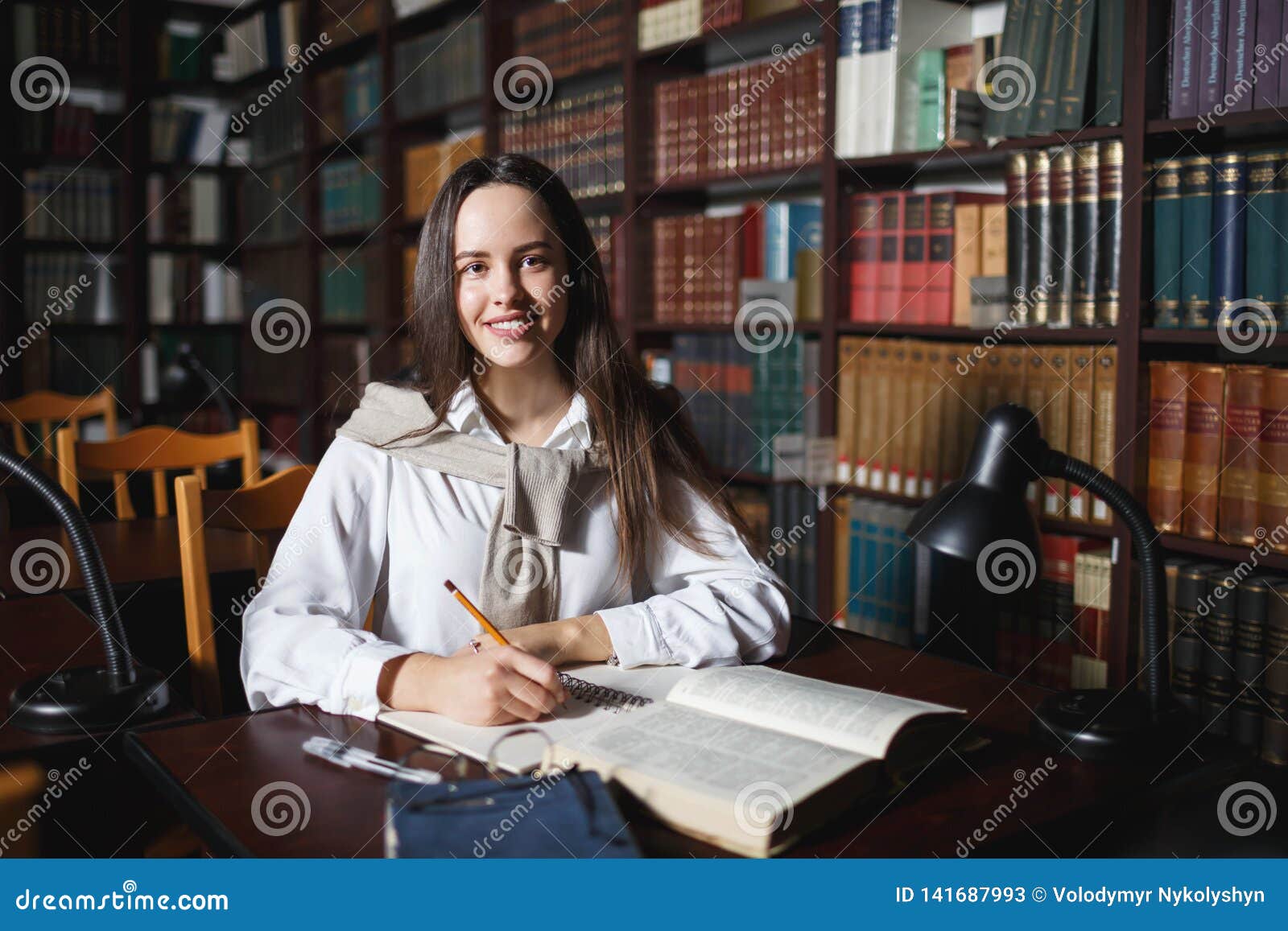 Female Student Studying in Library Stock Image - Image of book, reading ...
