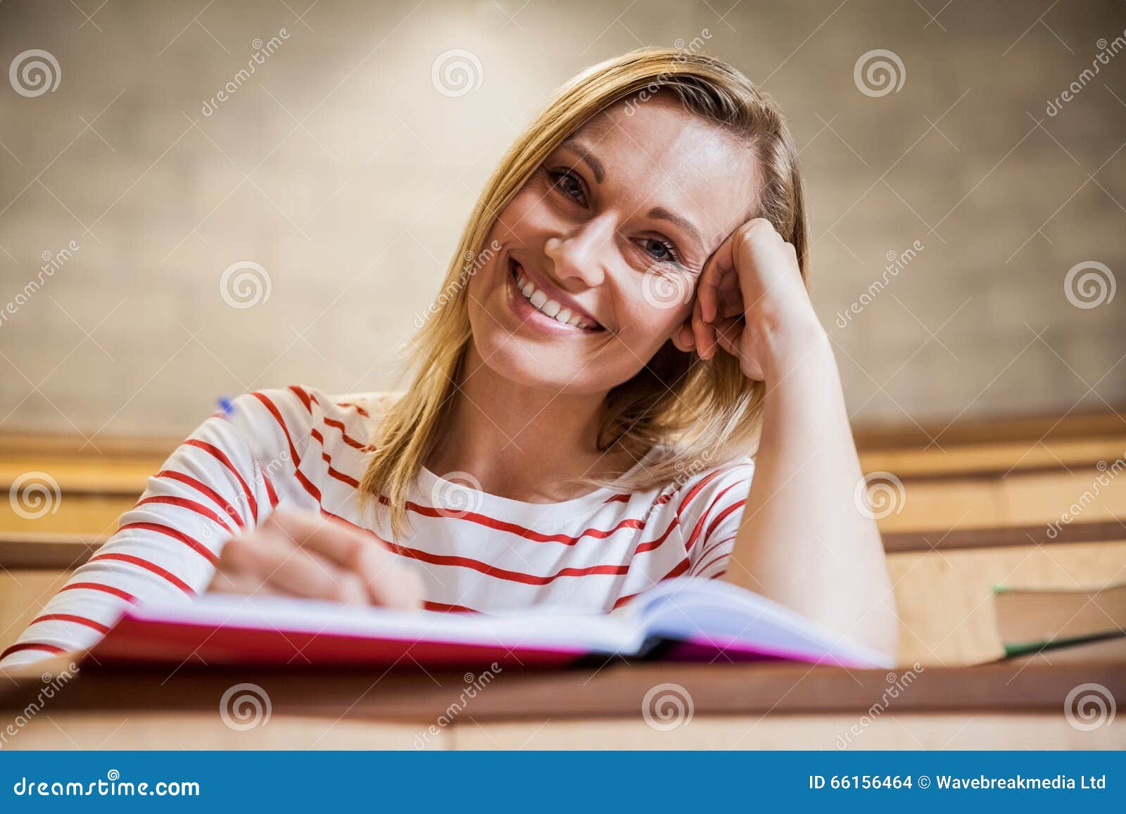 Female Student Taking Notes in a Class Stock Photo - Image of ...