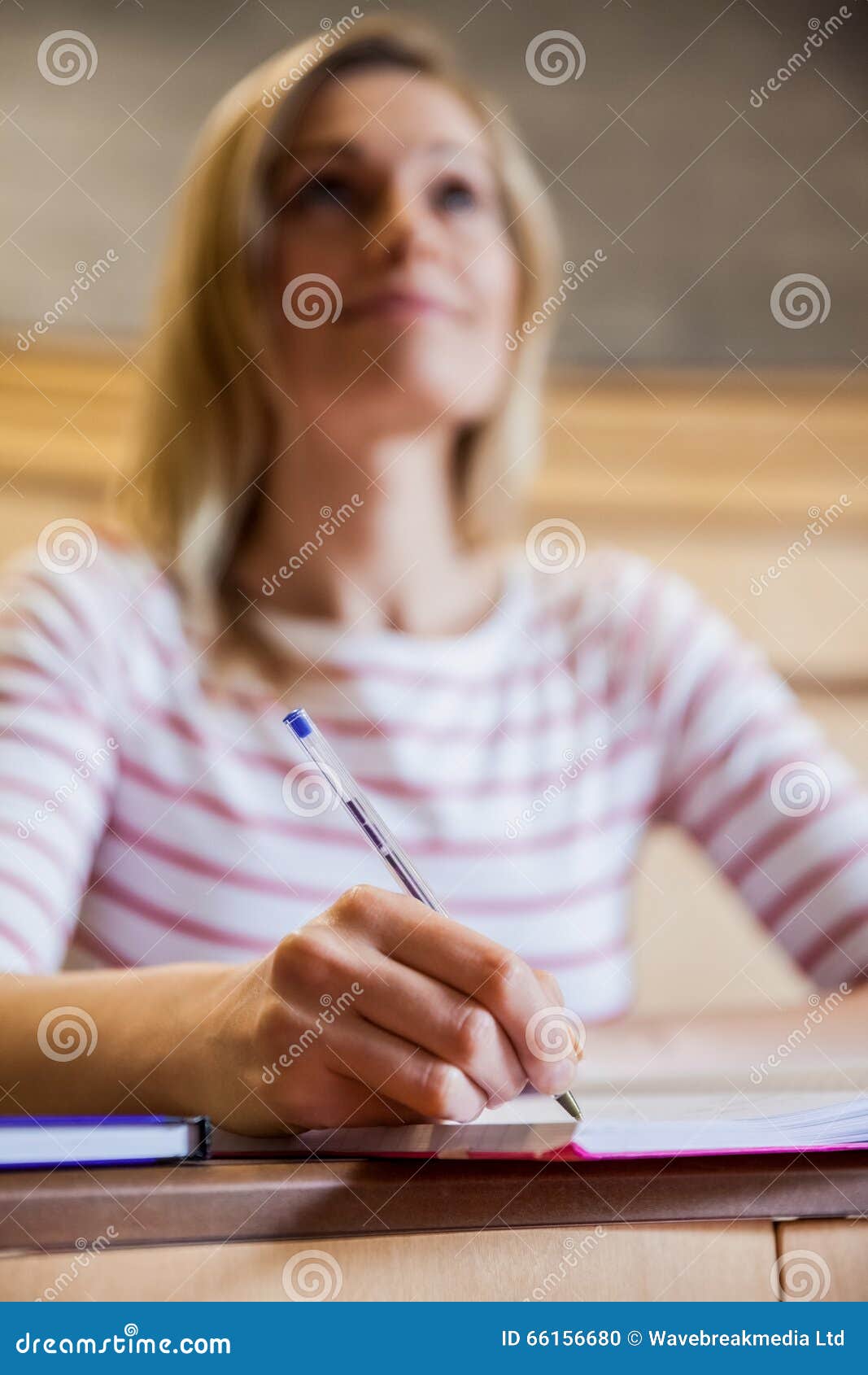 Female Student Taking Notes in a Class Stock Photo - Image of classroom ...