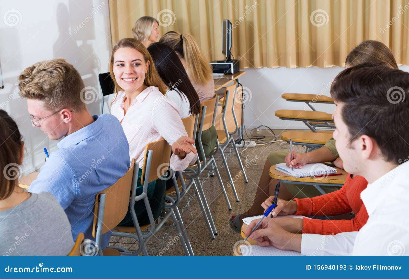 Female Student Talking with Groupmates during Classes Stock Image ...
