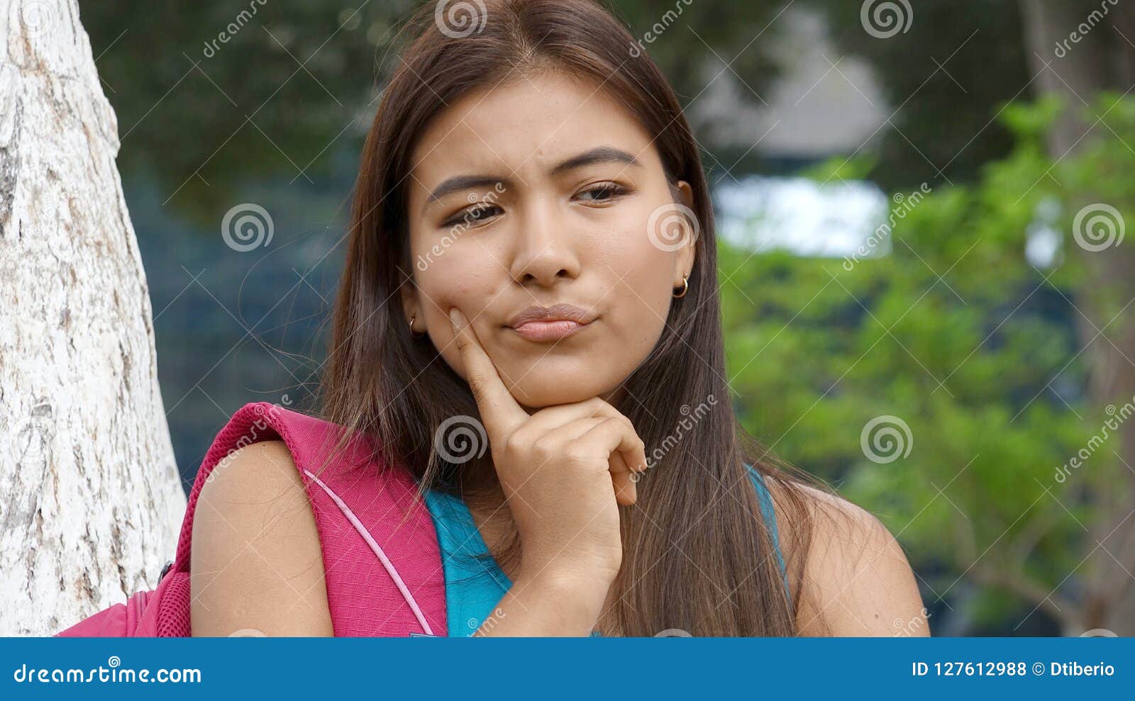 Female Student Thinking stock photo. Image of thoughtful - 127612988