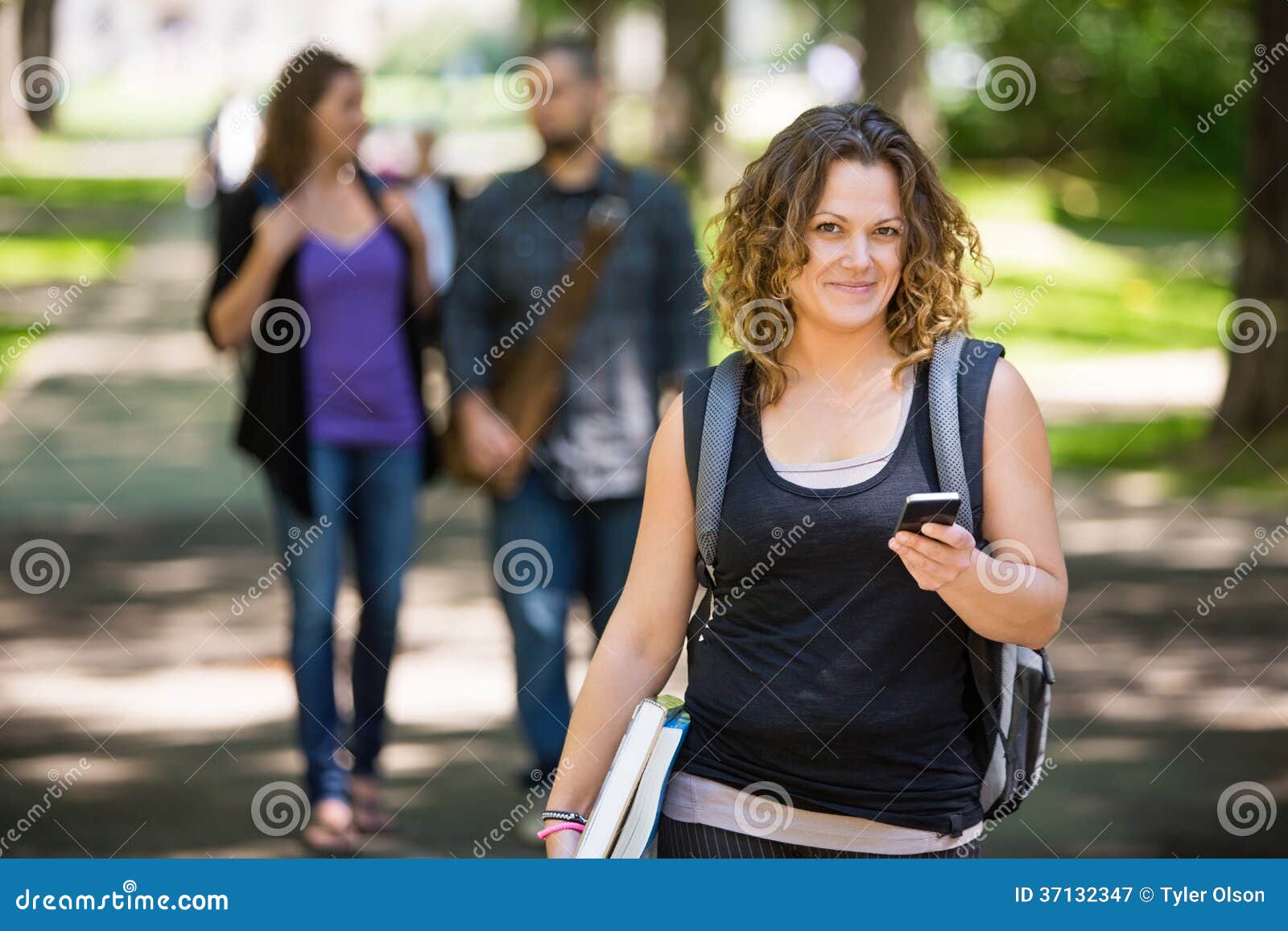 Female Student Using Cellphone on Campus Stock Image - Image of ...