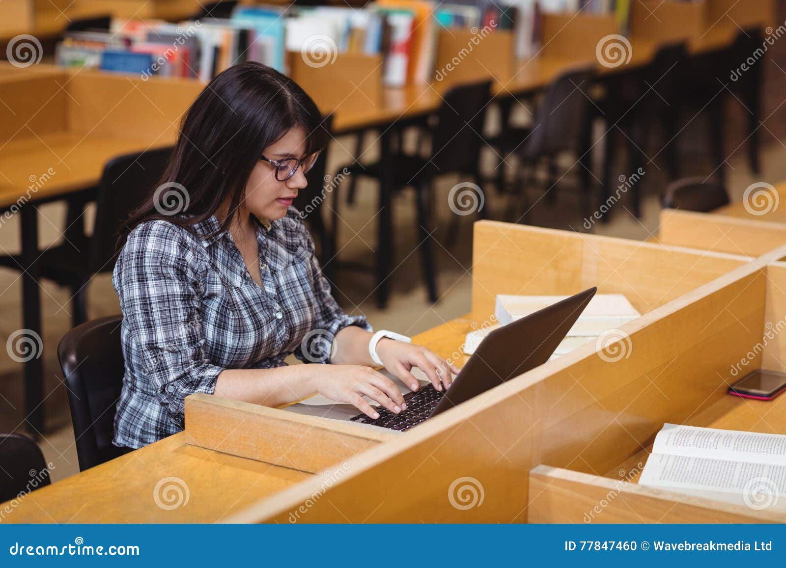 Female Student Using Laptop in Library Stock Photo - Image of desk ...