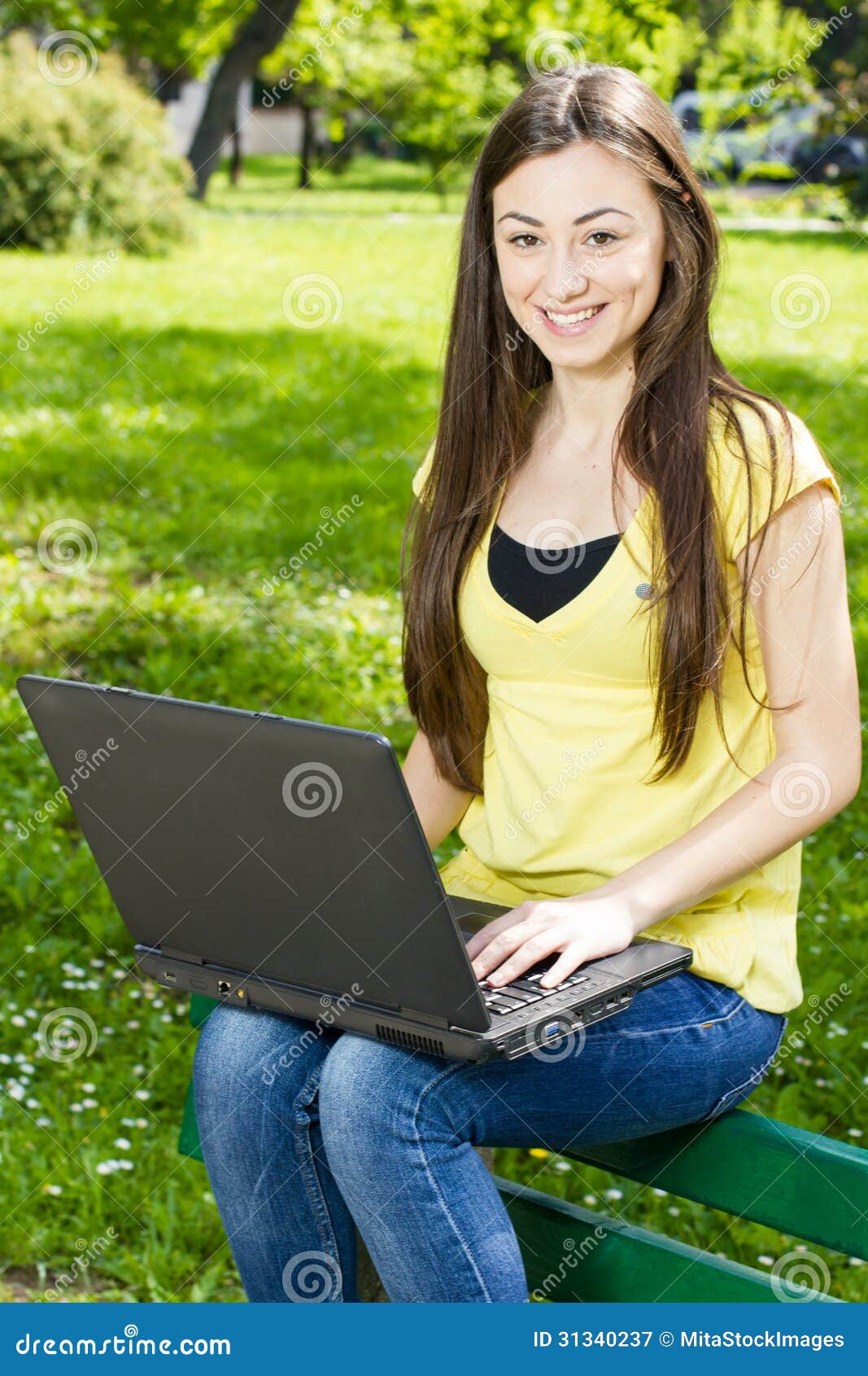 Female Student Using Laptop Stock Image - Image of green, girl: 31340237