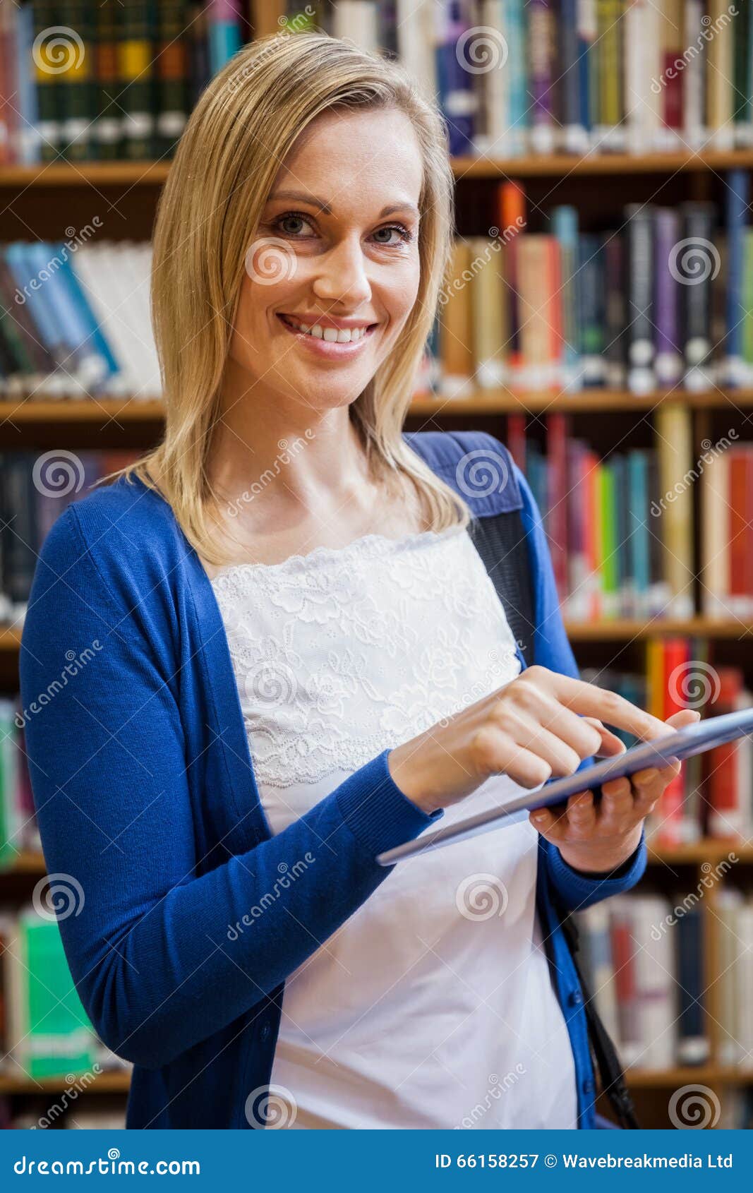 Female Student Using Tablet in the Library Stock Image - Image of ...