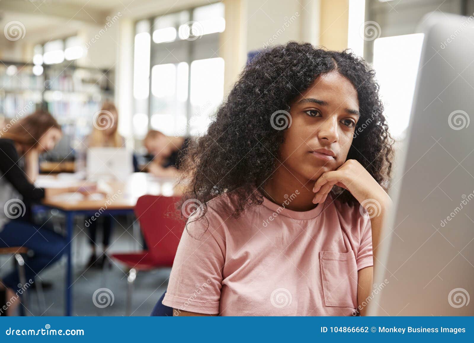 Female Student Working on Computer in College Library Stock Photo ...