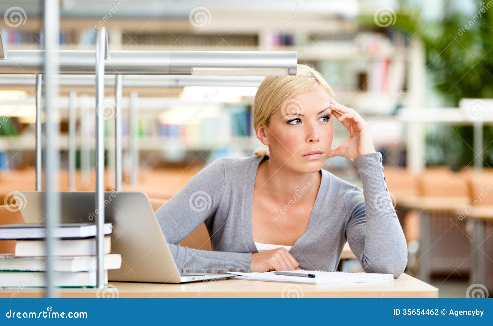 Female Student Working at the Desk Stock Photo - Image of hall, fatigue ...