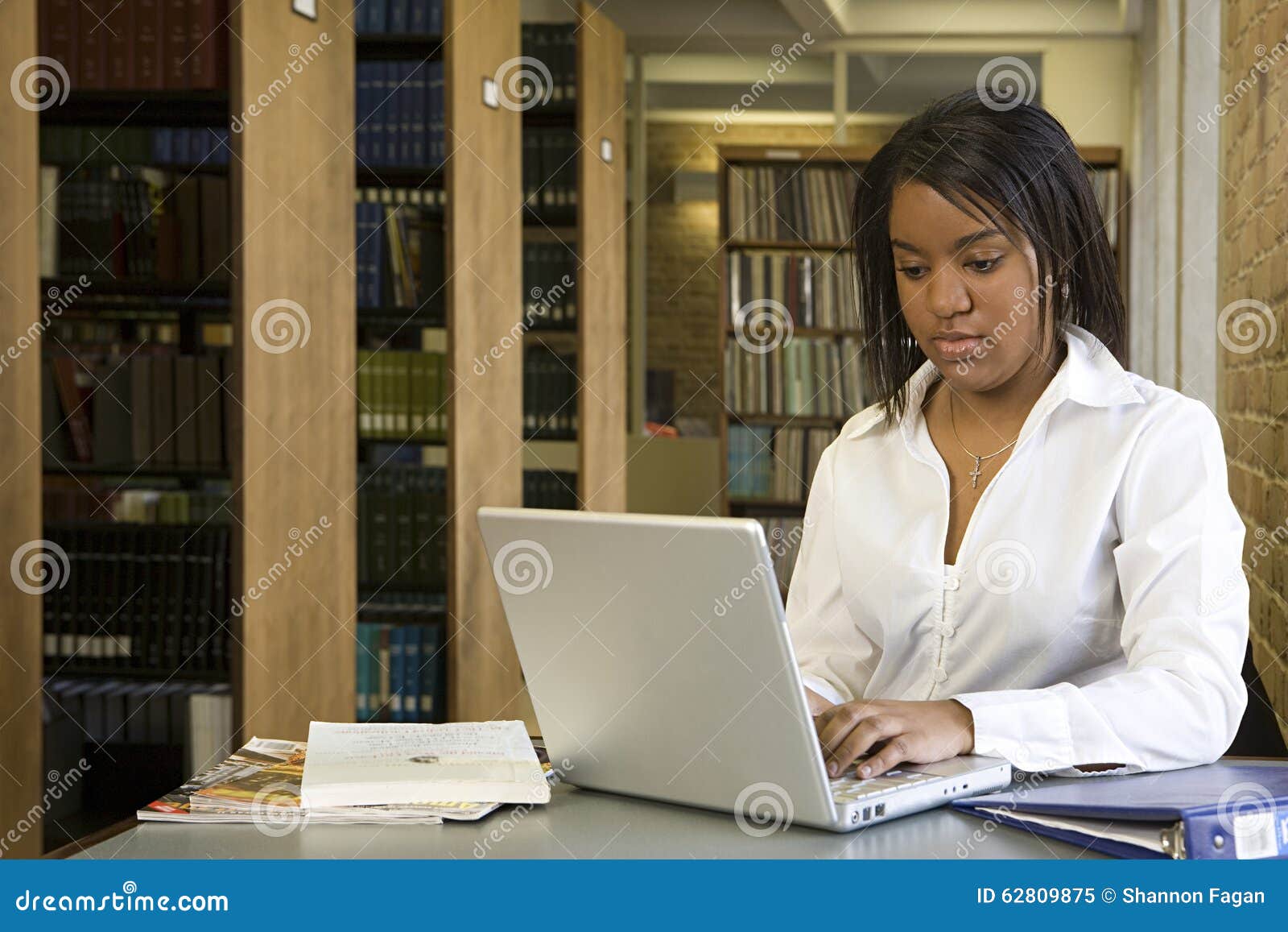 Female Student Working in the Library Stock Image - Image of assignment ...