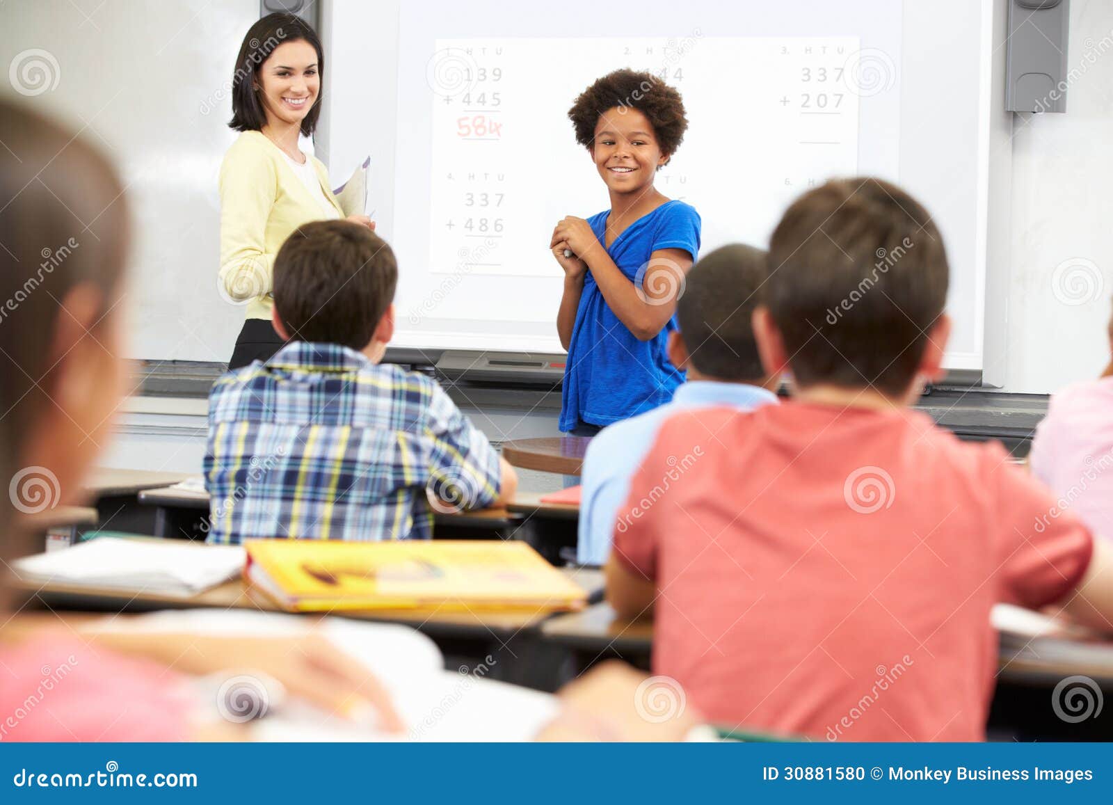 Female Student Writing Answer on Whiteboard Stock Photo - Image of ...