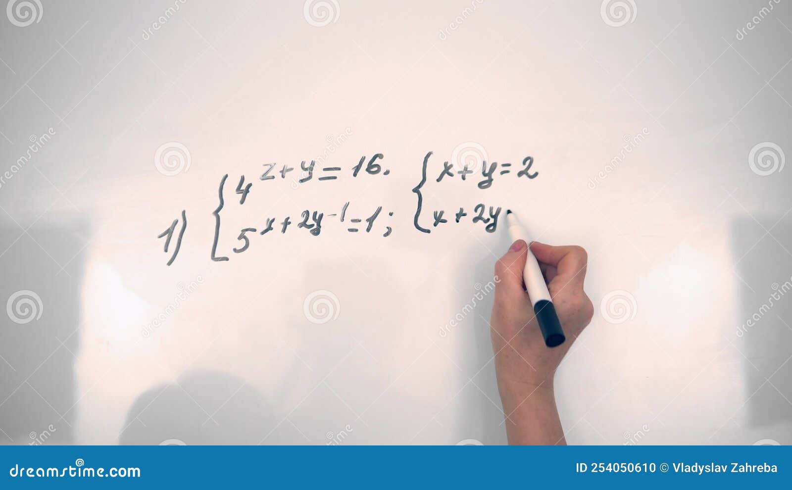 Female Student is Writing Math Equation on Whiteboard in the Cabinet ...