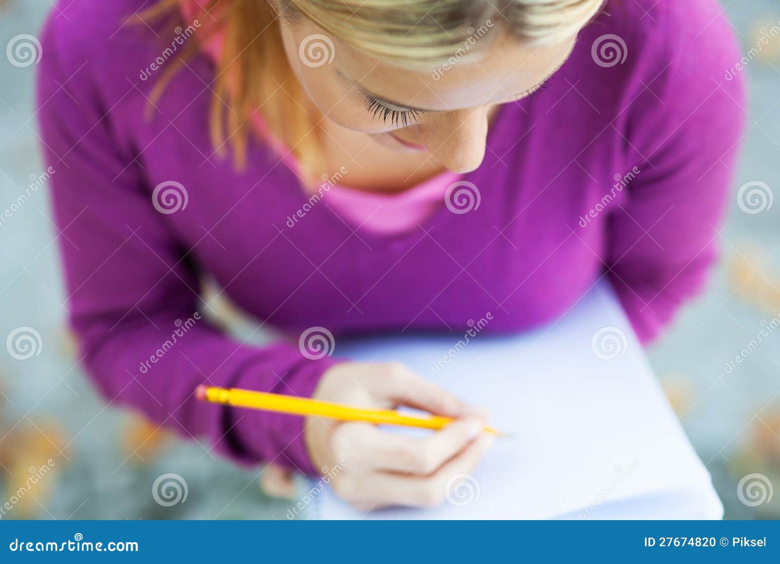 Female Student Writing in Notebook Stock Photo - Image of pencil ...