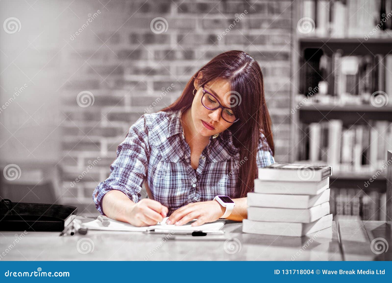 Female Student Writing Notes in Library Stock Photo - Image of clothing ...
