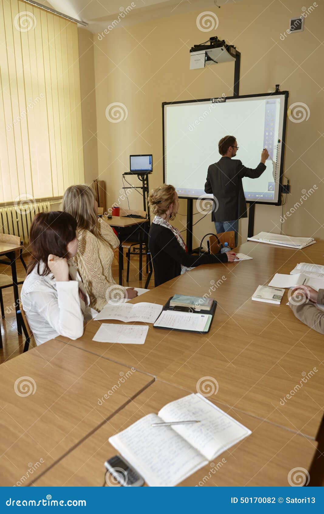 Female Students in Classroom Editorial Photography - Image of teacher ...