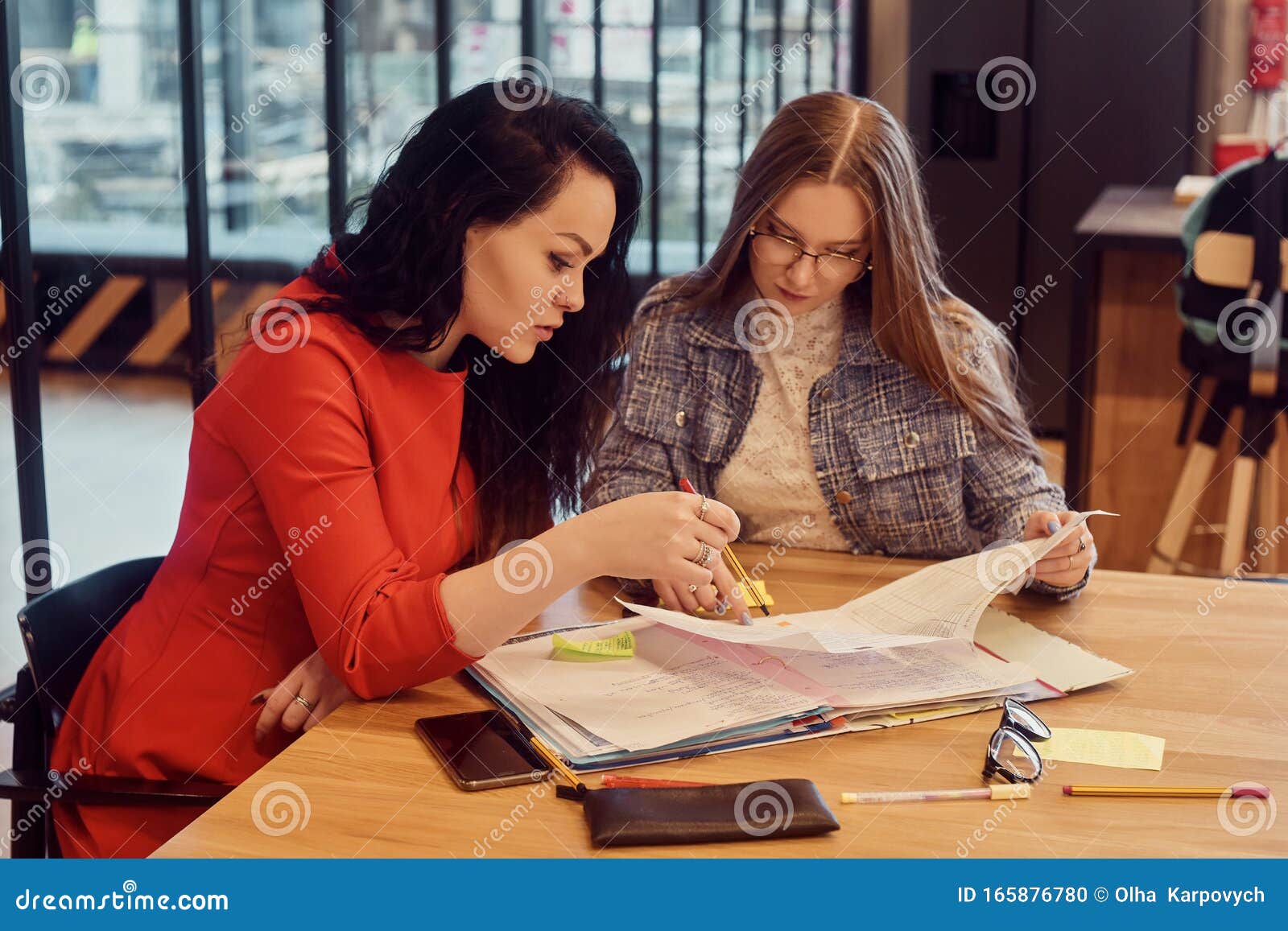 Office Workers, Sitting at Documents, the Girls are Working, the Guy is ...