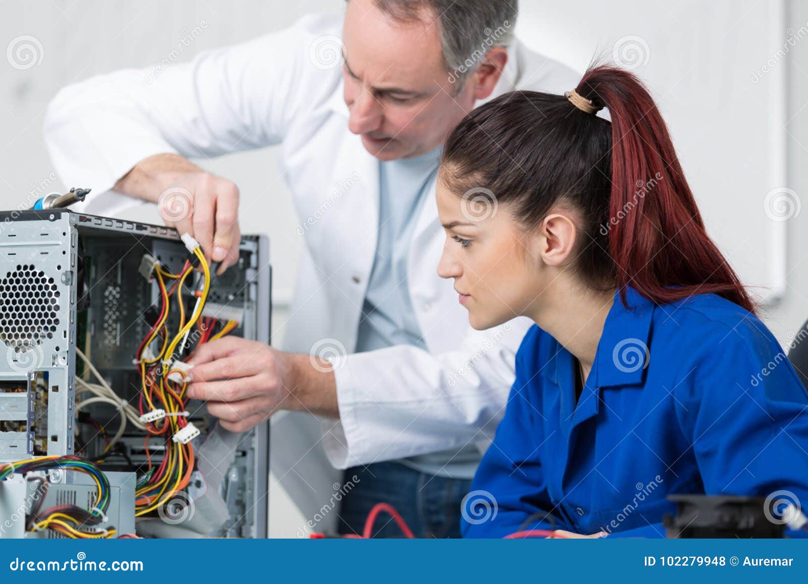 Female Students Fixing Laptop Stock Photo - Image of college, pupil ...