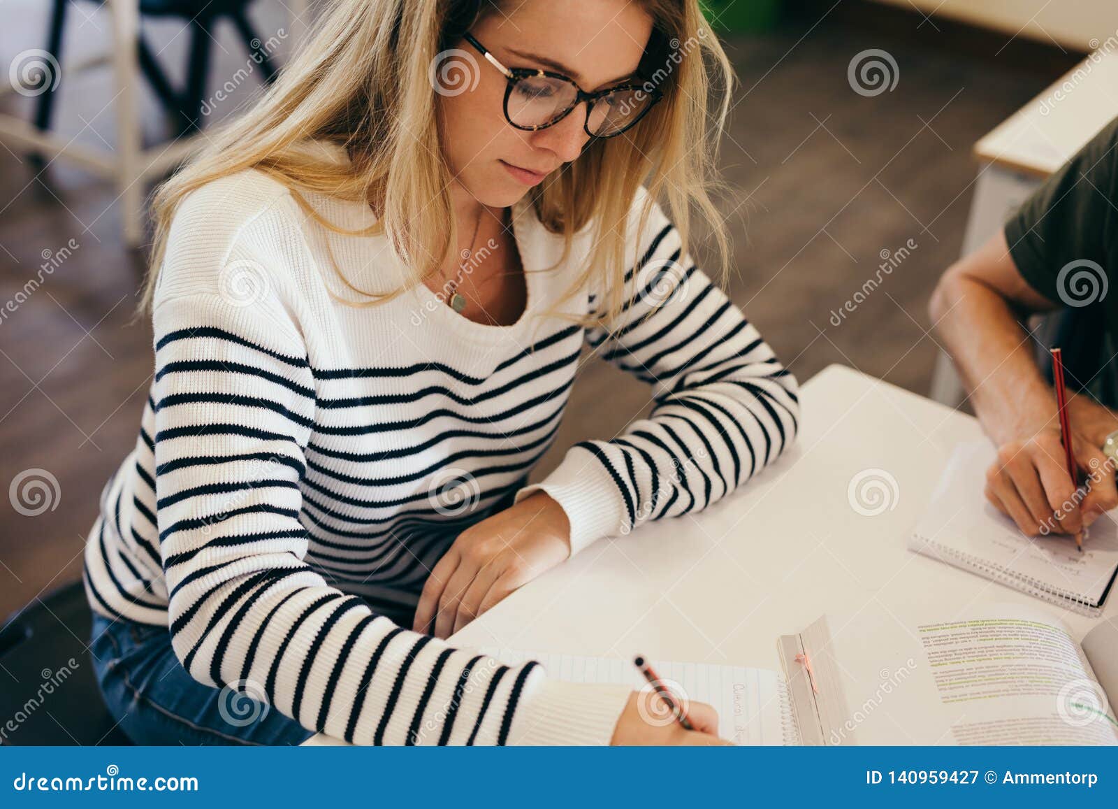 Female Students Studying with Classmates Stock Image - Image of teenage ...