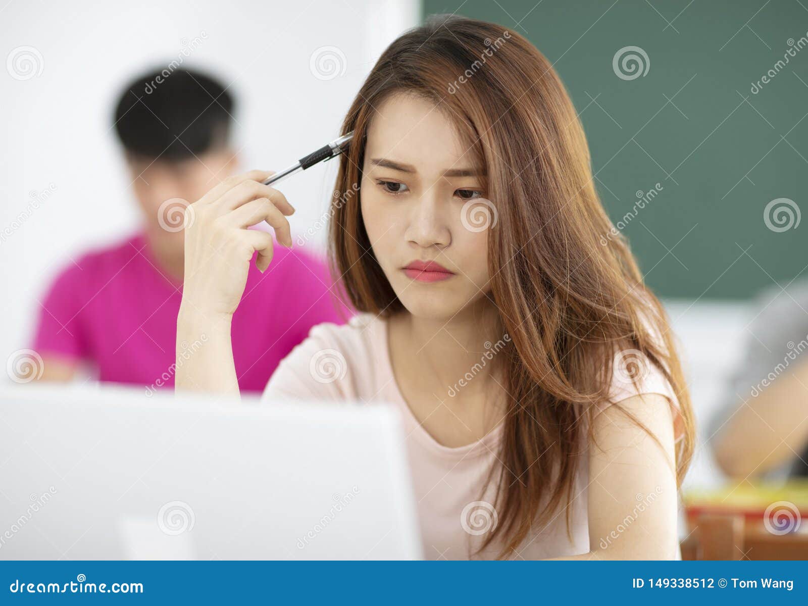 Female Students Thinking in Classroom Stock Photo - Image of school ...